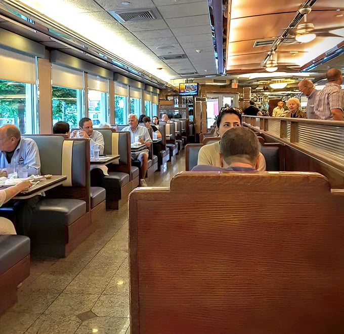 Where strangers become neighbors and neighbors become friends—the dining room hums with the soundtrack of community.