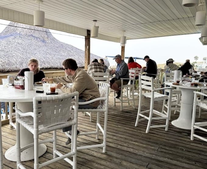Dining with a view that makes conversation optional. These high-top tables offer the perfect perch for people-watching and wave-gazing.