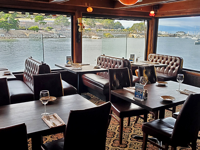 Those leather booths and panoramic bay views aren't just seating—they're front-row tickets to the greatest show on water.
