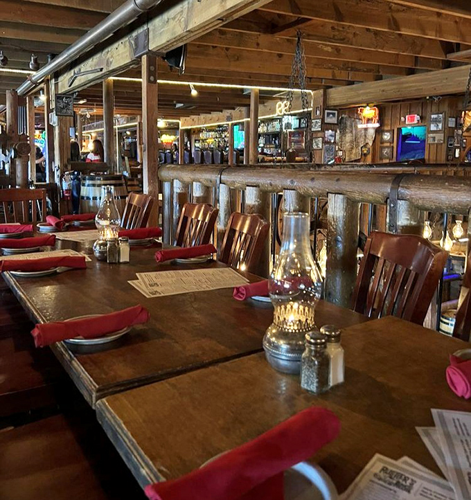 Rustic wooden tables bathed in warm lantern light create the perfect backdrop for making memories—and the occasional sauce-stained shirt worth framing.
