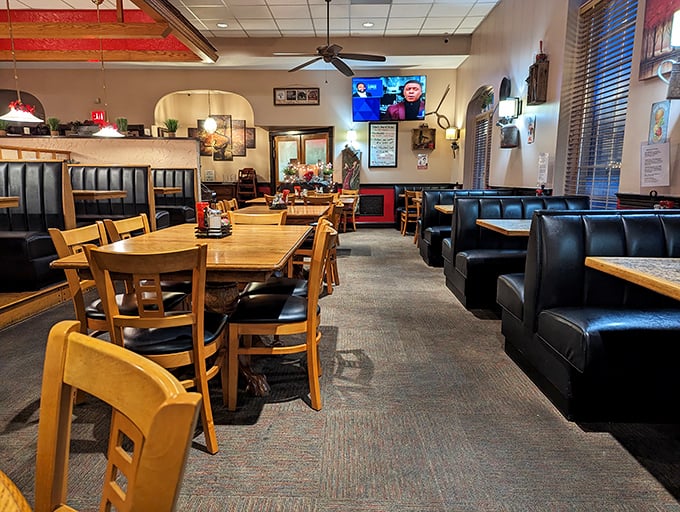 A dining room where conversations flow as easily as the coffee, with enough space between tables to keep your secrets safe.