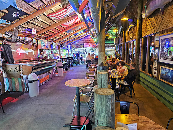 The tiki bar's colorful chaos is exactly where you want to be when the sun goes down and the seafood comes out. 