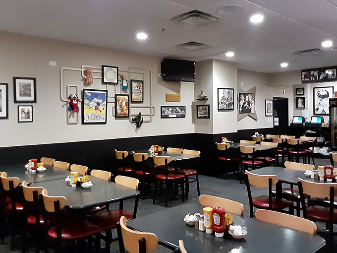 The wall art tells stories while the tables hold countless conversations—this isn't just dining, it's community happening over coffee refills.