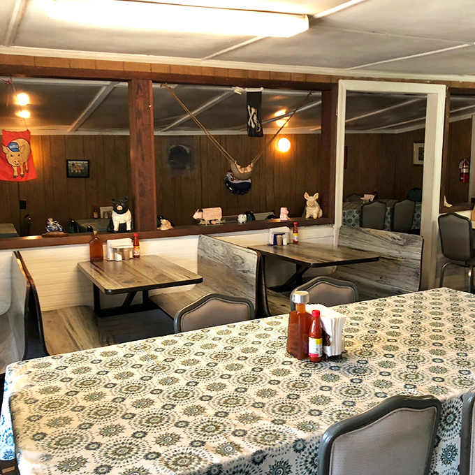 Tablecloths and pig figurines—the dining room decor at B's reminds you that priorities are firmly in the right place.