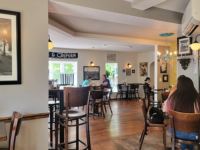 The dining area balances charm and function, with enough French touches to make you contemplate ordering everything with an exaggerated accent.