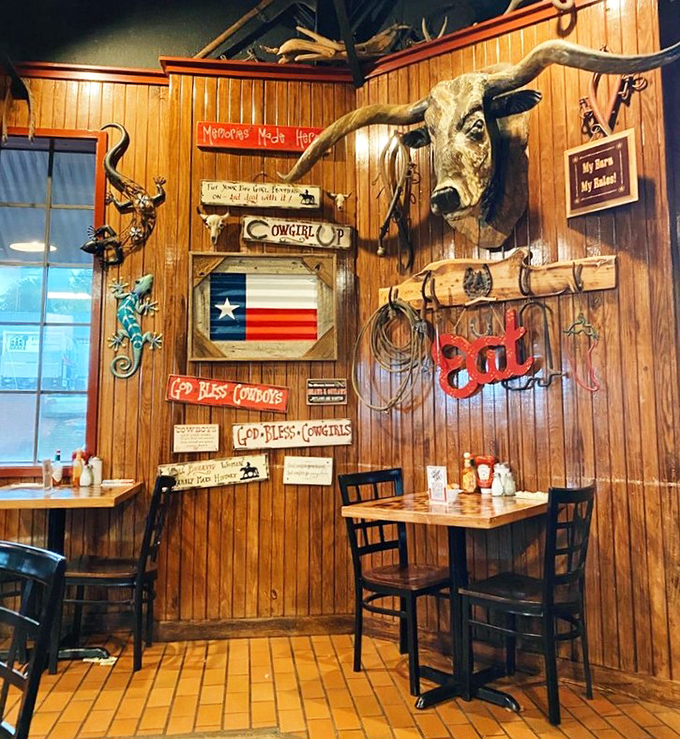 Wood-paneled walls, longhorn decorations, and enough Texas pride to fill the Alamo—this isn't just themed dining, it's a full immersion experience.