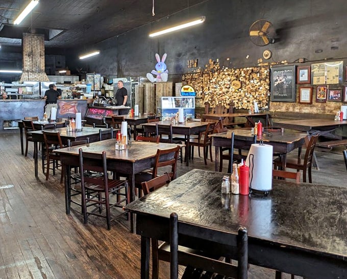 Tables worn smooth by countless elbows and sauce-stained fingers – this dining room has witnessed more joy than a lottery office.