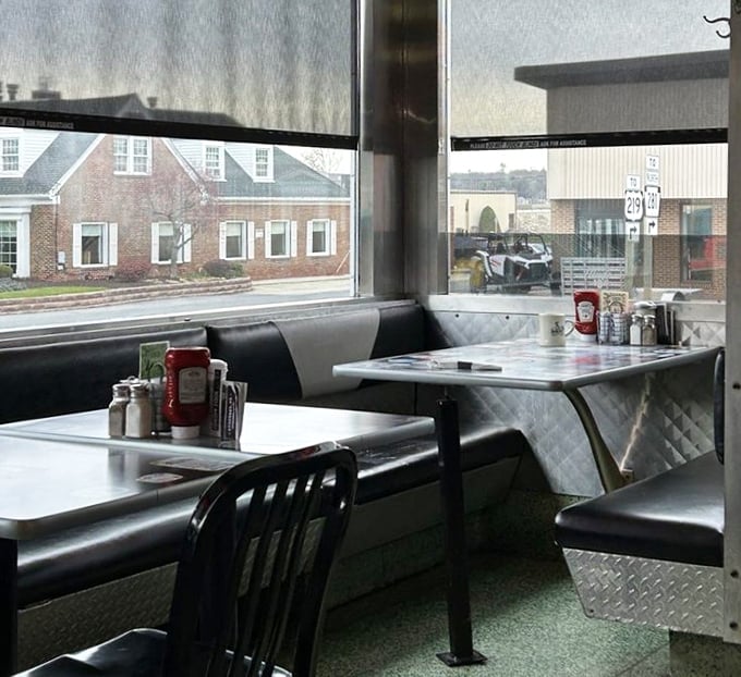Window booths: where you can watch the world go by while contemplating life's big questions, like "Should I order pie now or later?"
