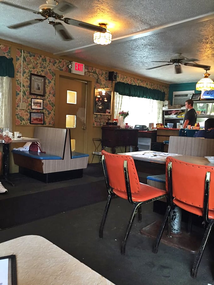 The dining area feels like a time capsule where conversations matter more than cell service and the orange chairs have witnessed decades of Akron stories.