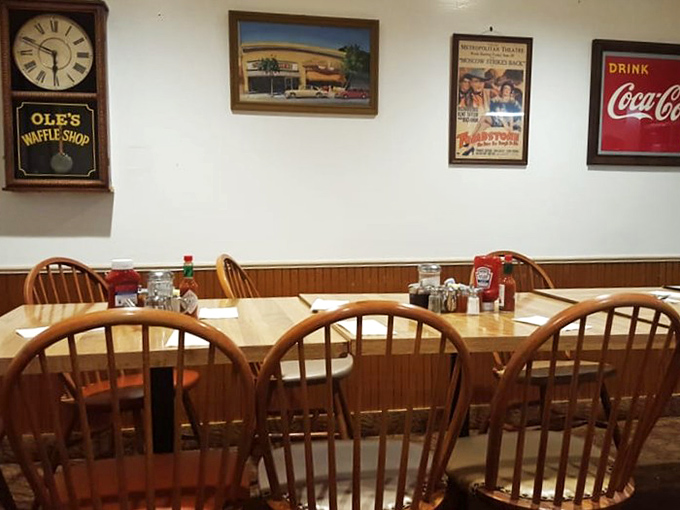 The dining area speaks volumes without saying a word: wooden chairs, classic diner tables, and walls that have witnessed countless morning revelations.