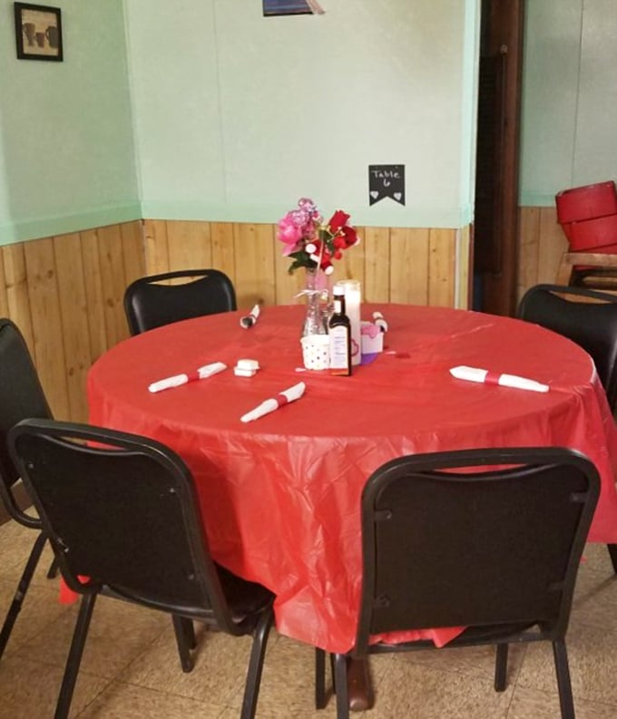 Red tablecloths and simple chairs create that "everybody knows your name" vibe where conversations matter more than decor.