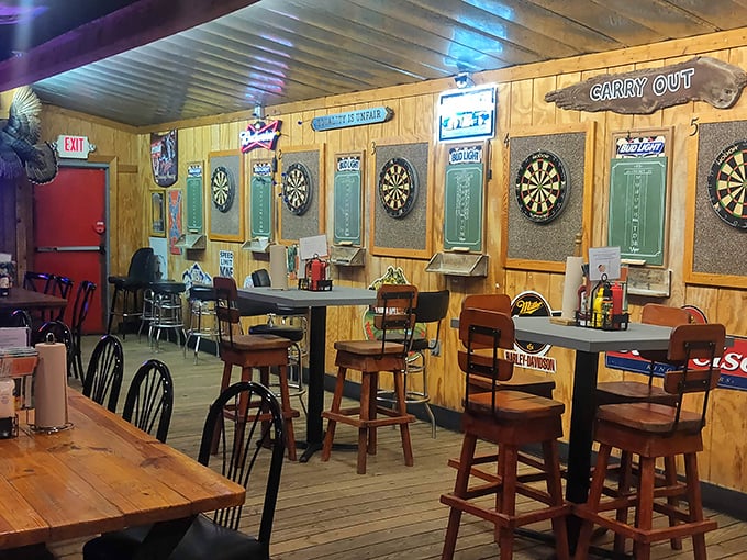 The dart room—where friendships are tested, bragging rights are earned, and cold beer flows as freely as the conversation.