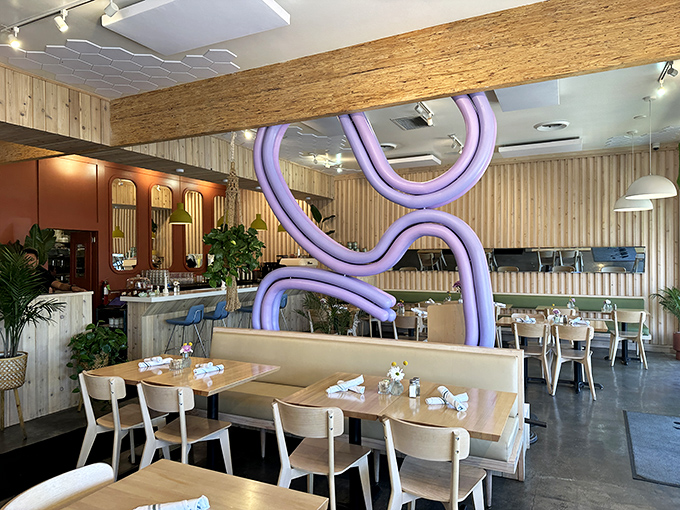 That sculptural purple swirl isn't just decor – it's conversation-starting art. Breakfast with a side of California cool.
