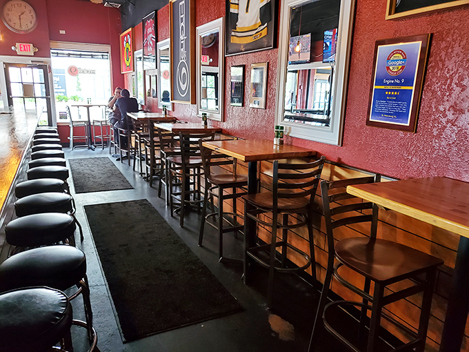 The dining area's red walls and wooden tables create that perfect "come as you are" vibe. Casual enough for flip-flops, worthy of your best appetite.