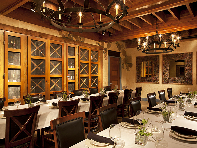 The private dining room looks like it was designed for people who make important decisions about mergers or marriage proposals—possibly both in the same evening.