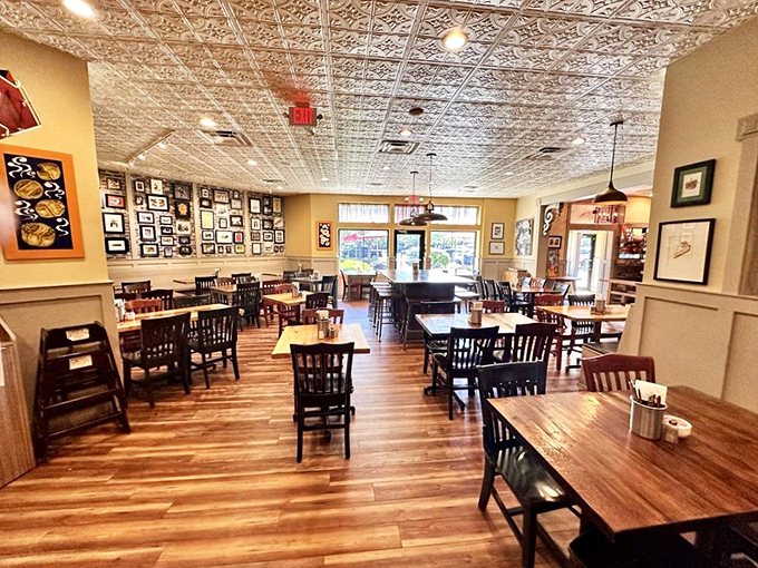 The dining room waits expectantly, like a theater before the show. Soon these tables will host the drama of delicious consumption.