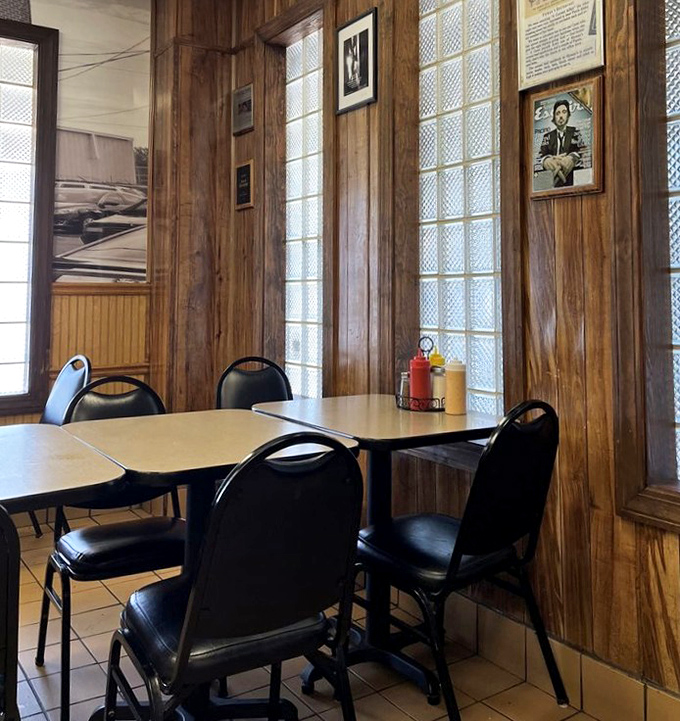 Wood paneling and glass block windows create the perfect time capsule—a deli where conversations matter as much as the corned beef.