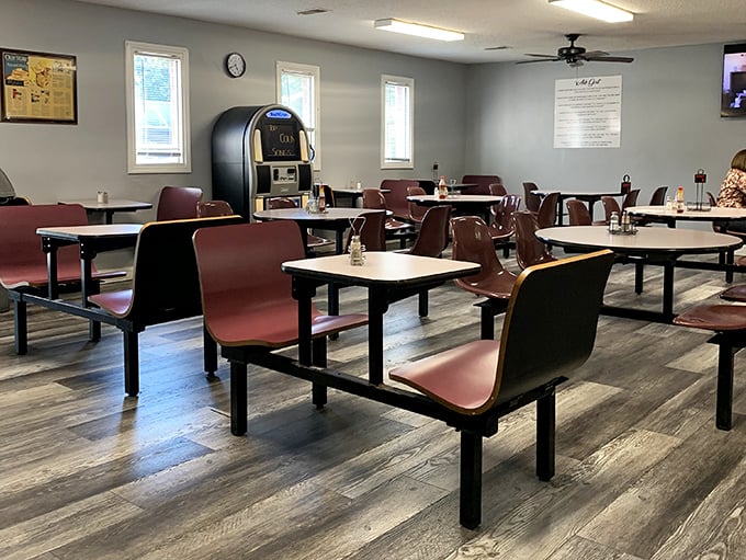 No designer lighting or Instagram walls here—just honest seating where the only filter you need is the one making your coffee.