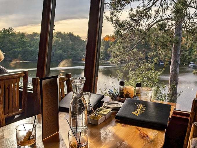 Tables positioned for maximum lake-gazing. Even the water glasses seem to understand they're just supporting characters in this panoramic theater.