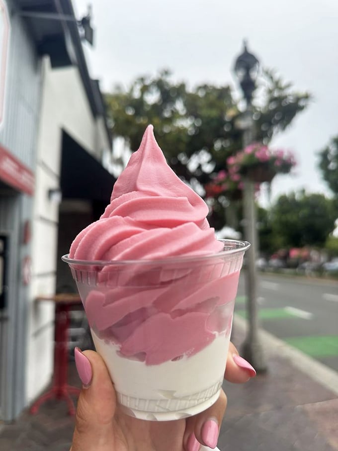 This dreamsicle creation looks like sunset captured in a cup – orange and pink swirls that taste like childhood summers.