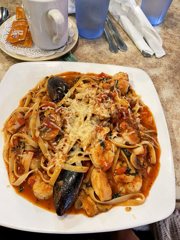 Seafood fettuccine that doesn't skimp on the ocean's bounty. Those mussels aren't just for show – they're flavor bombs waiting to happen.
