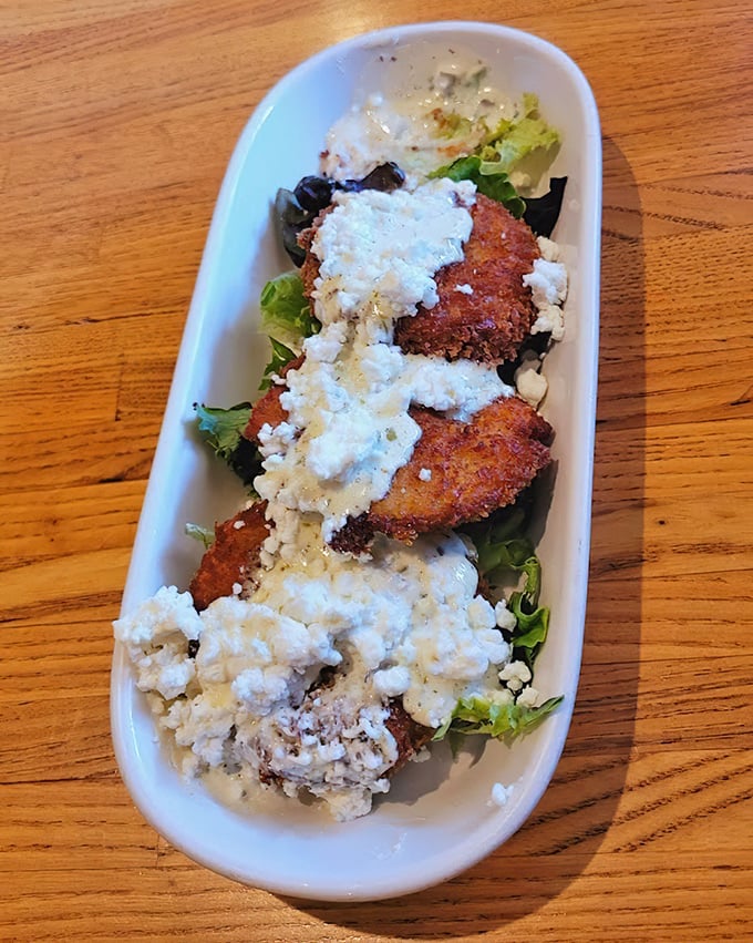 Fried green tomatoes topped with feta – Southern tradition meets Mediterranean flair in a dish that makes vegetable-skeptics reconsider their position.