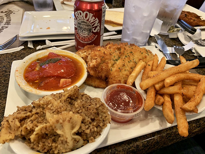This isn't just dinner; it's a comfort food symphony where fried chicken conducts and the sides play perfect harmony.