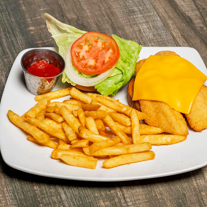 This fried fish sandwich with crispy fries proves that sometimes the simplest pleasures deliver the most satisfying rewards.