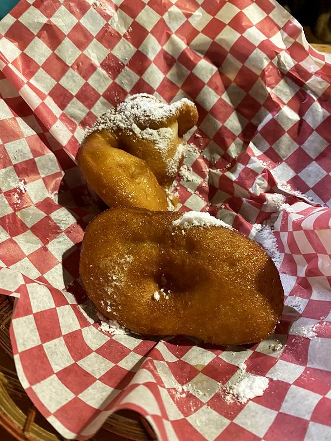 These golden fritters aren't just fried dough—they're edible proof that life's simplest pleasures are often the most satisfying.