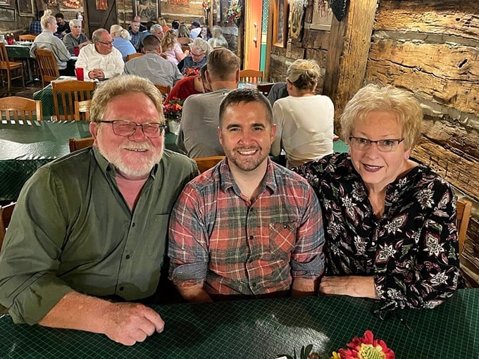 The real magic of The Log Inn isn't just on your plate—it's the connections made around the table. Three generations of smiles say it all.