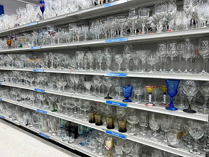 The glassware section sparkles under fluorescent lights, a crystal wonderland where your grandmother's favorite pattern is waiting to be rediscovered.
