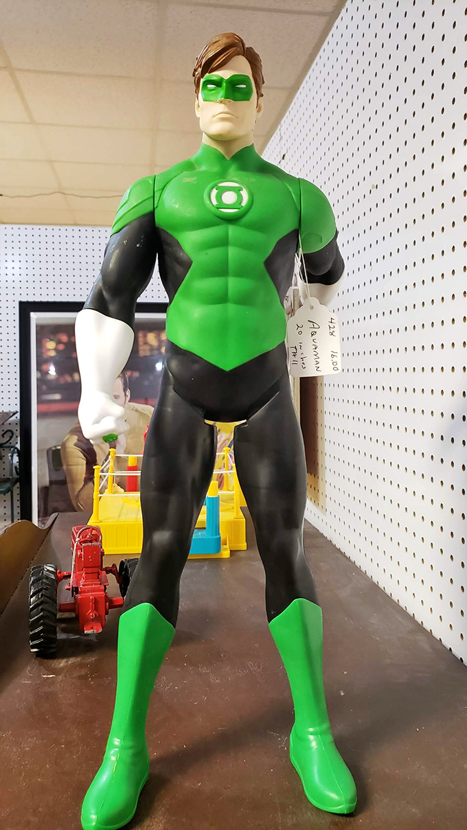Holy collectibles, Batman! This Green Lantern figure stands ready to protect your shelf from boring décor. Superhero swagger included.