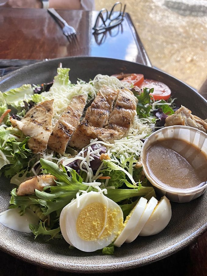 A chicken salad that means business. Those sliced eggs aren't just garnish—they're a promise that this plate understands proper protein distribution.