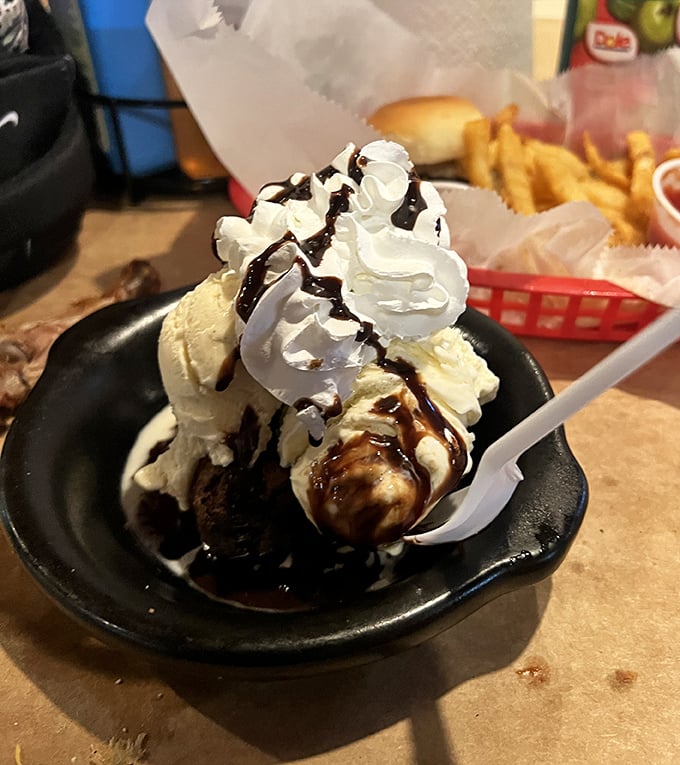 This hot fudge sundae isn't just dessert—it's the sweet finale that makes you forget you just wrestled with crab shells for an hour.