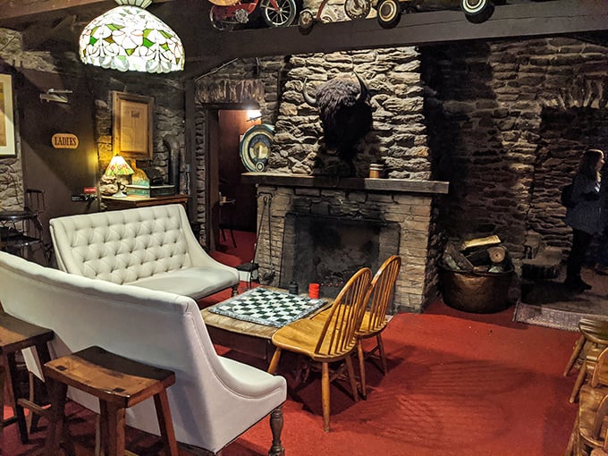 The stone fireplace and checkerboard table create a living room vibe so comfortable you'll be tempted to kick off your shoes and stay until breakfast.