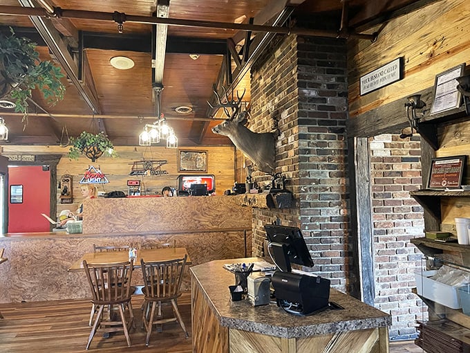 Where mounted deer heads and brick fireplaces create the ultimate "welcome home" vibe. This isn't interior design—it's a warm Tennessee hug in restaurant form.