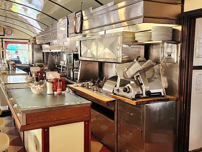 The kitchen ballet unfolds behind stainless steel, where decades of breakfast wisdom transforms simple ingredients into morning masterpieces.