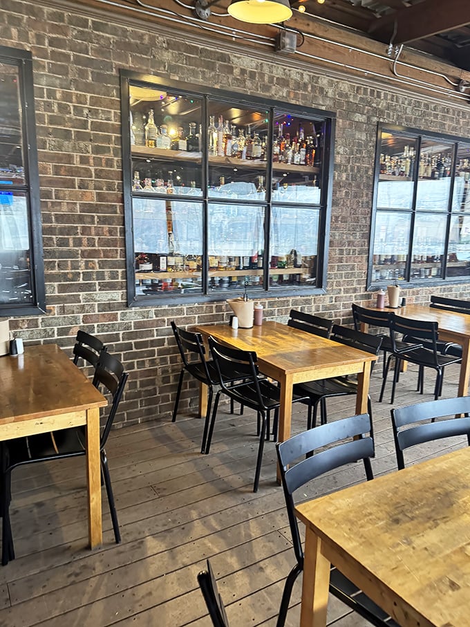 Exposed brick, wooden tables, and a well-stocked bar—the trifecta of Texas hospitality wrapped in an atmosphere that says "stay awhile."