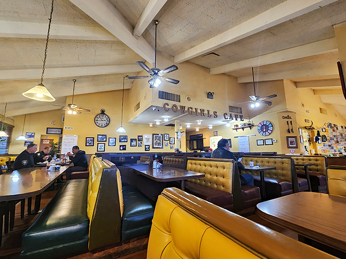 The dining room feels like breakfast at your favorite aunt's house—if your aunt had impeccable taste in yellow vinyl and ceiling fans.