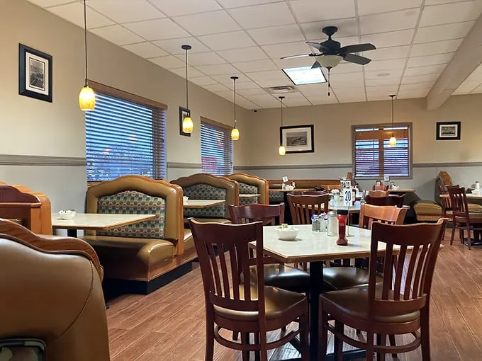 Booths designed for comfort, not Instagram. Those pendant lights cast the perfect glow for both menu-reading and the "should I get dessert?" debate (spoiler: yes).