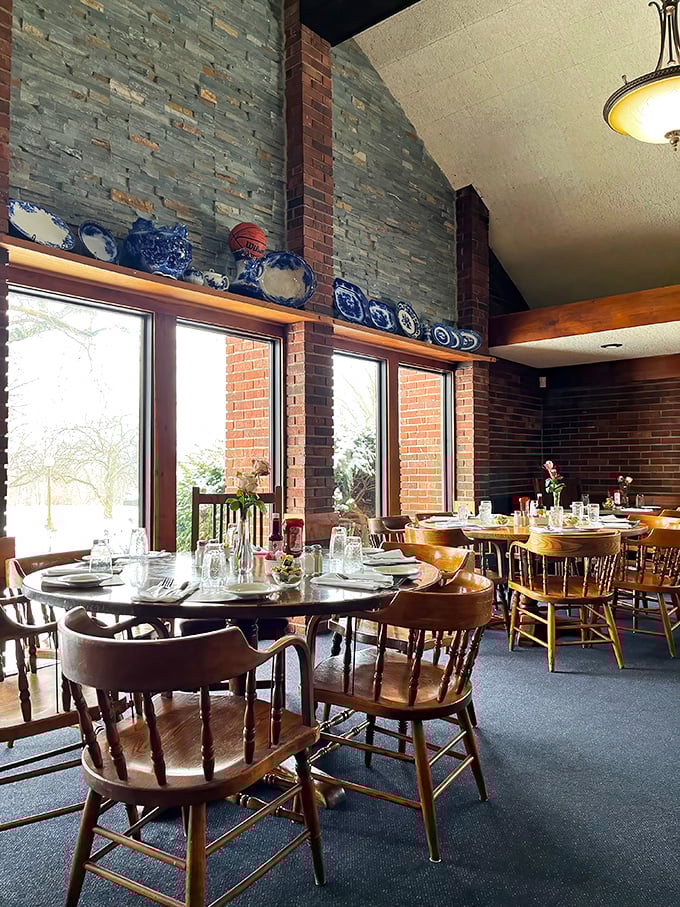Blue decorative plates line the shelves like trophies, watching over diners as they embark on their culinary pilgrimage through beef country.