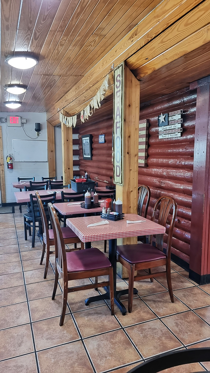 Red checkered tablecloths and log cabin walls – this isn't designed to be rustic; it simply is. Authenticity you can't buy from a decorator.