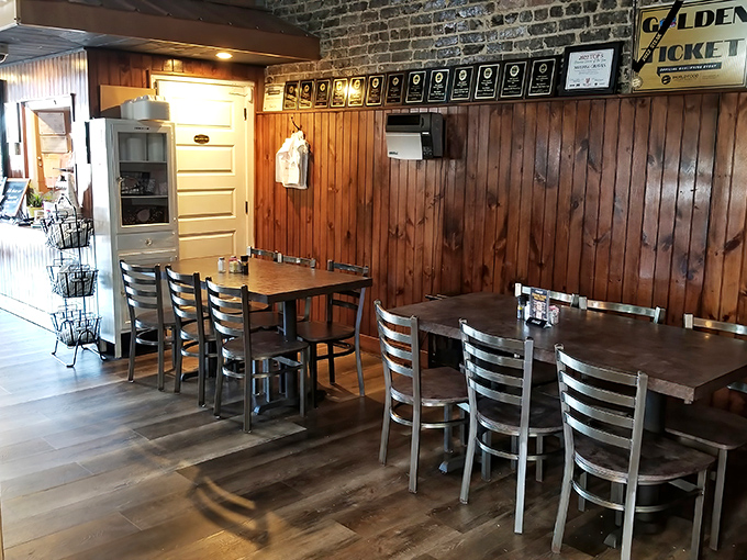Wood paneling that's seen decades of conversations, celebrations, and first dates. Those plaques on the wall tell stories of community pride.