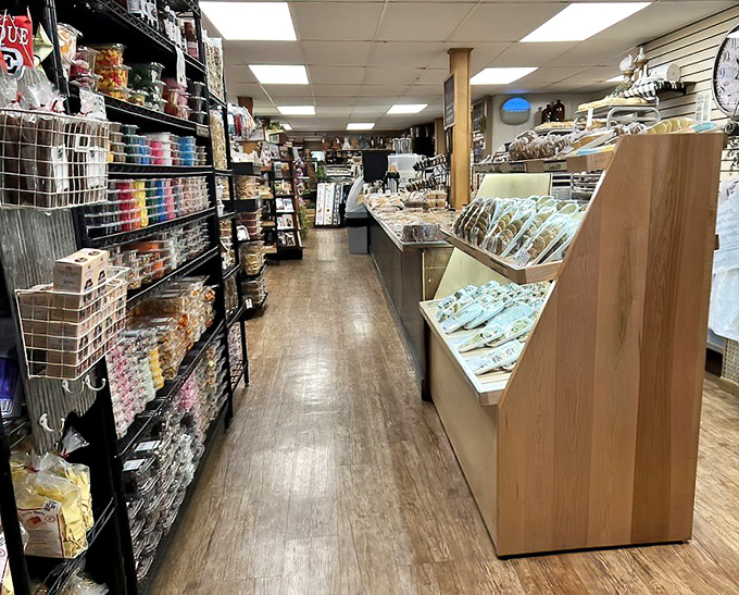 The grocery aisle stretches into infinity, offering treasures beyond the bakery counter. A wonderland of Amish country pantry essentials awaits exploration.