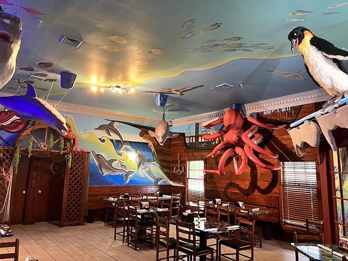 Underwater fantasy meets dining reality. That giant octopus on the wall has seen things—mainly people doing victory dances after finding empty tables.