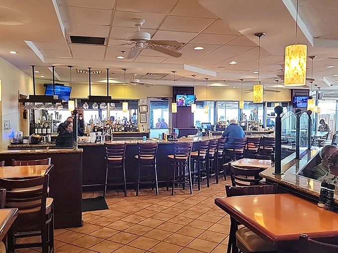 The bar area strikes that perfect balance between "nice enough for date night" and "casual enough that nobody minds if you're still sandy."