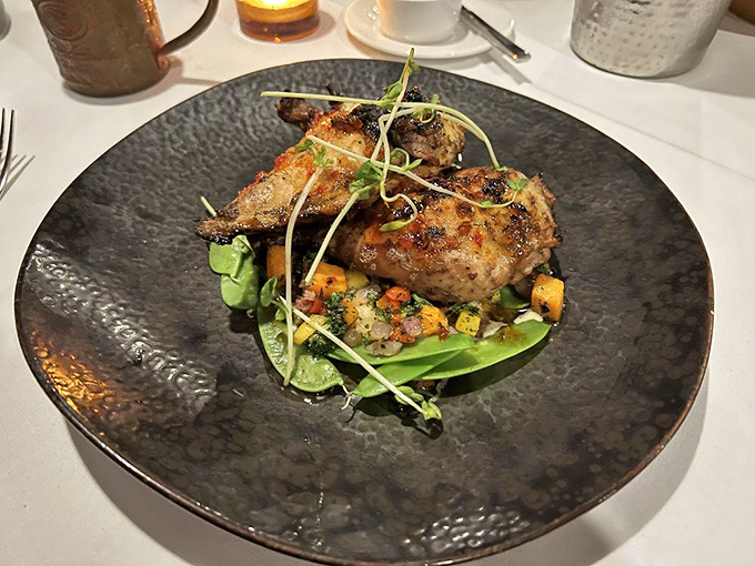 Chicken elevated to art form—crispy skin, tender meat, and a colorful vegetable medley that proves side dishes deserve the spotlight too.
