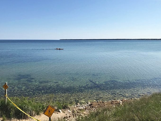 Solitude on sapphire waters. A lone kayaker discovers what explorers have known for centuries—the best views of Wisconsin come from offshore.