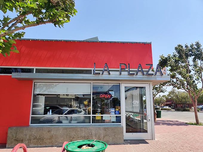 La Plaza's vibrant red façade promises authentic flavors inside—the kind of place where calories don't count because they're too delicious.
