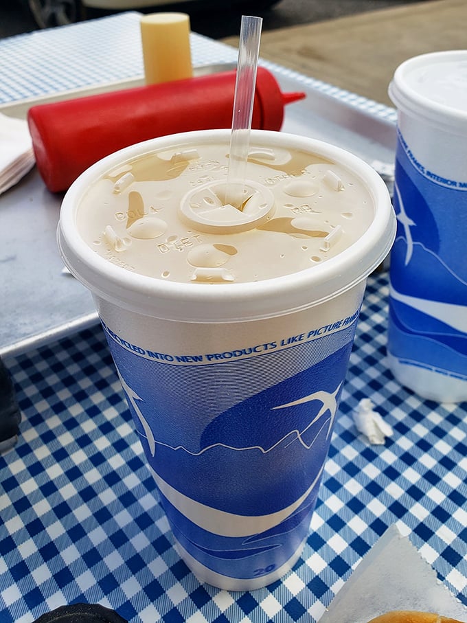 The humble lemon blend in its blue cup – proof that sometimes the most refreshing beverages don't need fancy mixologists or elaborate garnishes.